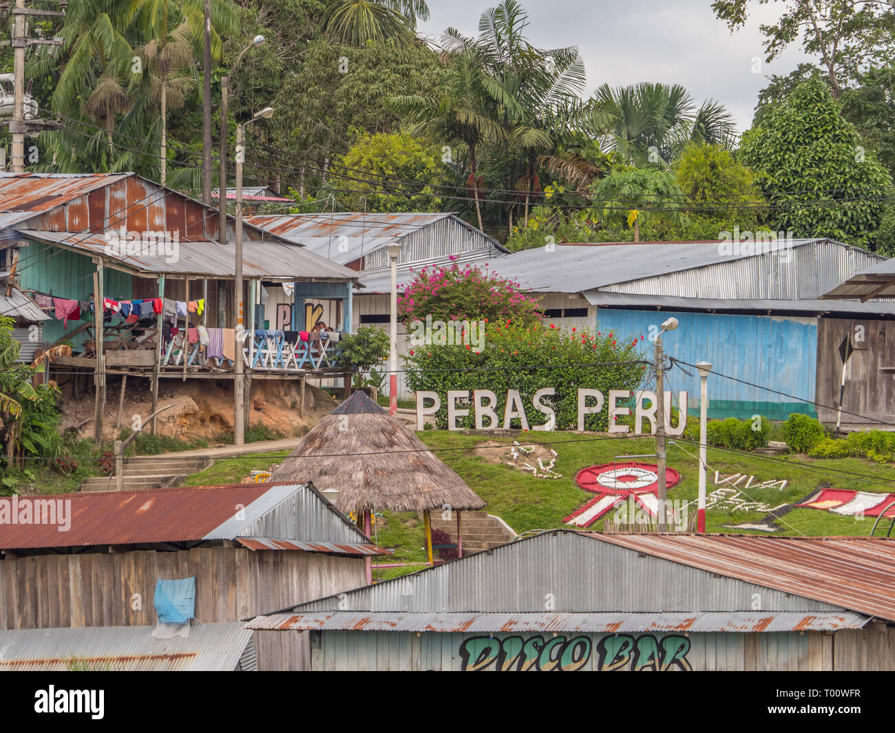 Pebas, Peru - December 04 , 2018: View of village on the bank of the ...