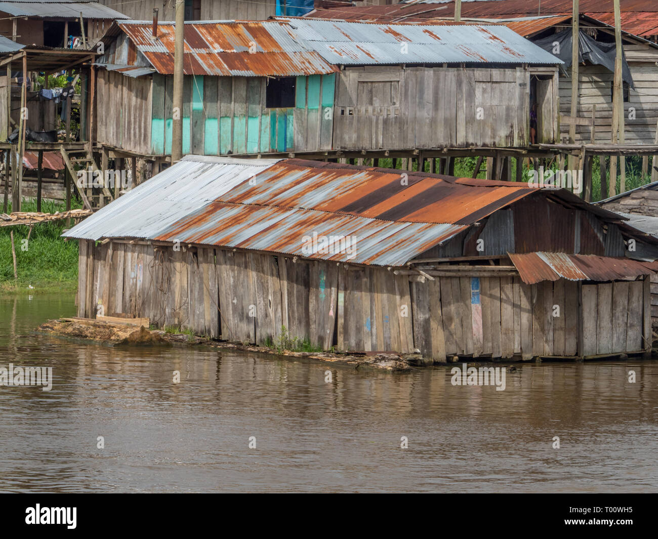 Pebas, Peru - December 04 , 2018: View of village on the bank of the ...