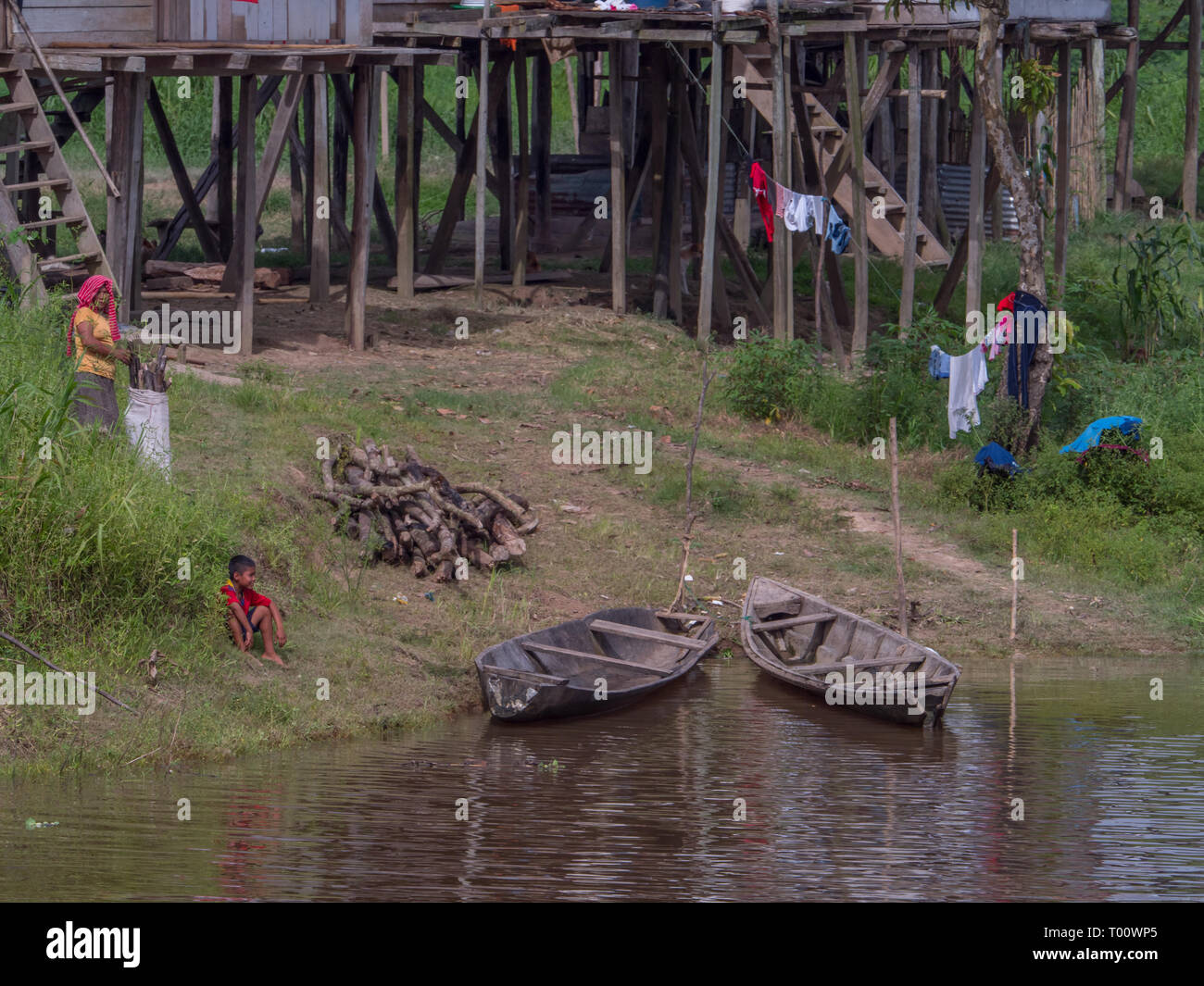 Pebas, Peru - December 04 , 2018: View of village on the bank of the ...