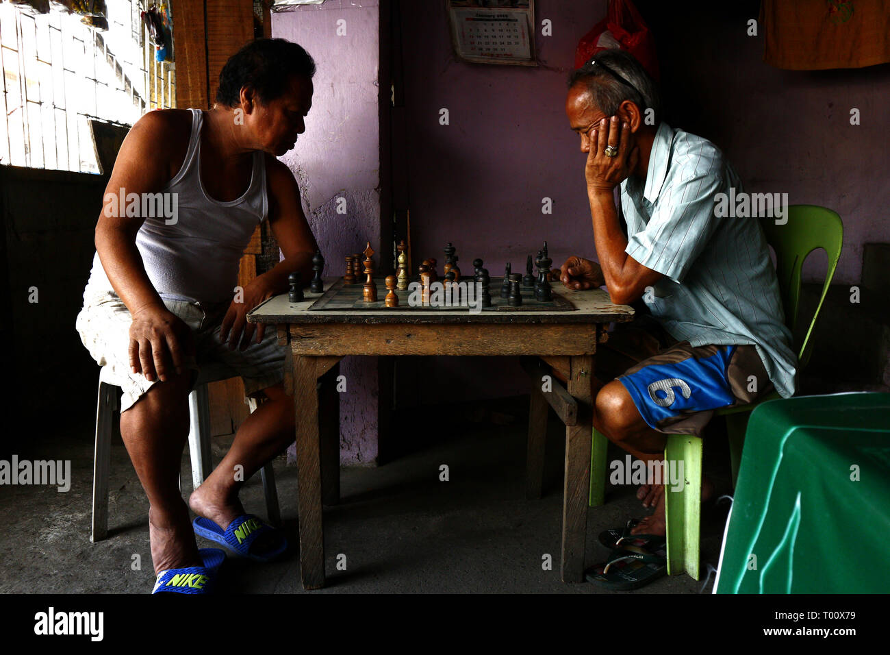 ANTIPOLO CITY, PHILIPPINES - MARCH 11, 2019: Filipino men relax and ...