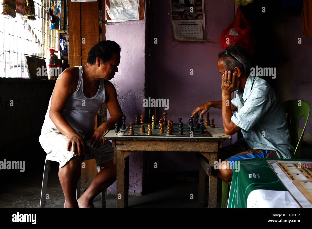 ANTIPOLO CITY, PHILIPPINES - MARCH 11, 2019: Filipino men relax and ...