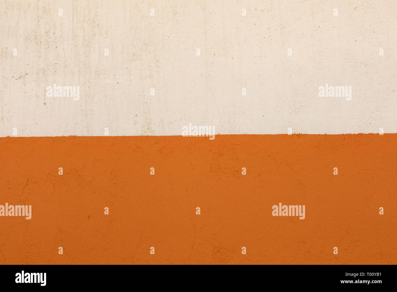 Outer wall with two types of paint for use wallpaper Stock Photo - Alamy
