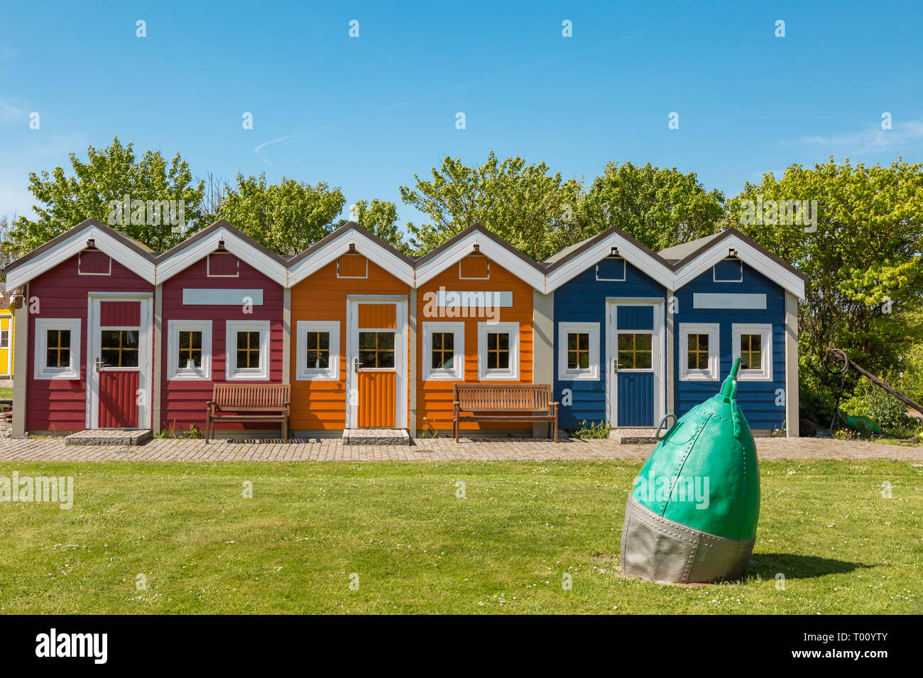 Colorful cabins in a row Stock Photo - Alamy