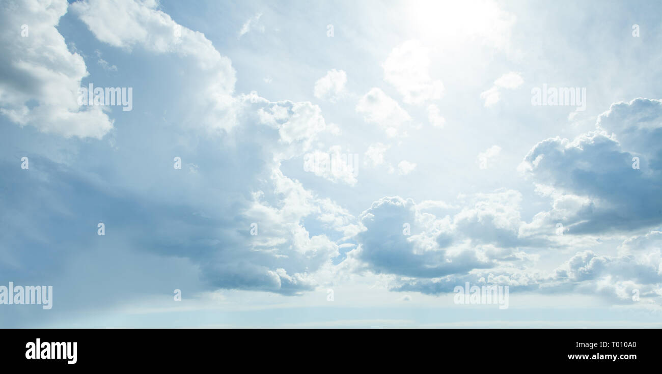 Sky and clouds with sun light, nature background Stock Photo - Alamy