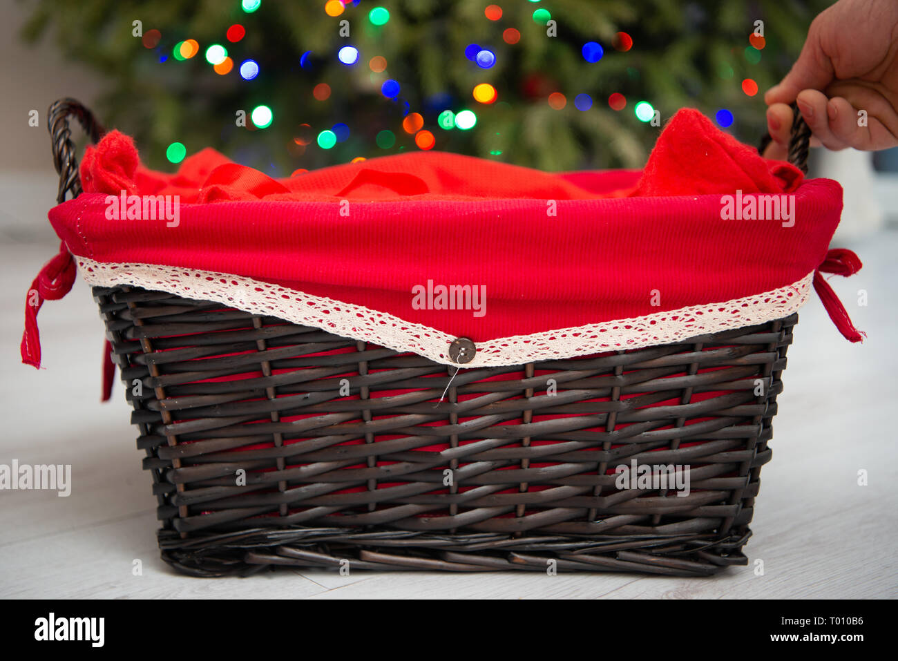 Brown Christmas hamper with red material with Christmas tree in ...