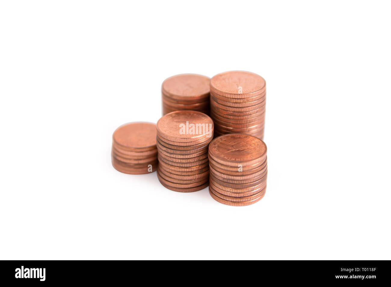 Stacks of copper coins isolated on white background with clipping path ...