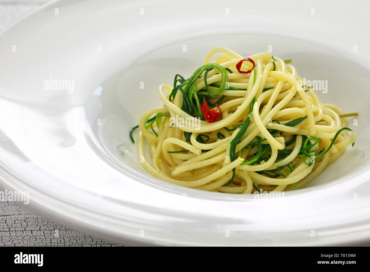 spagetti with agretti, italian food Stock Photo - Alamy