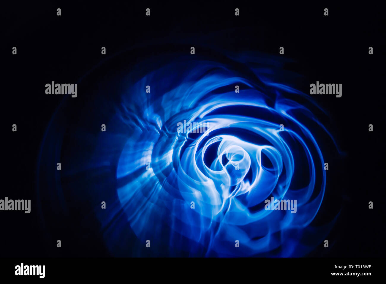 Sound waves in the visible blue color in the dark Stock Photo - Alamy