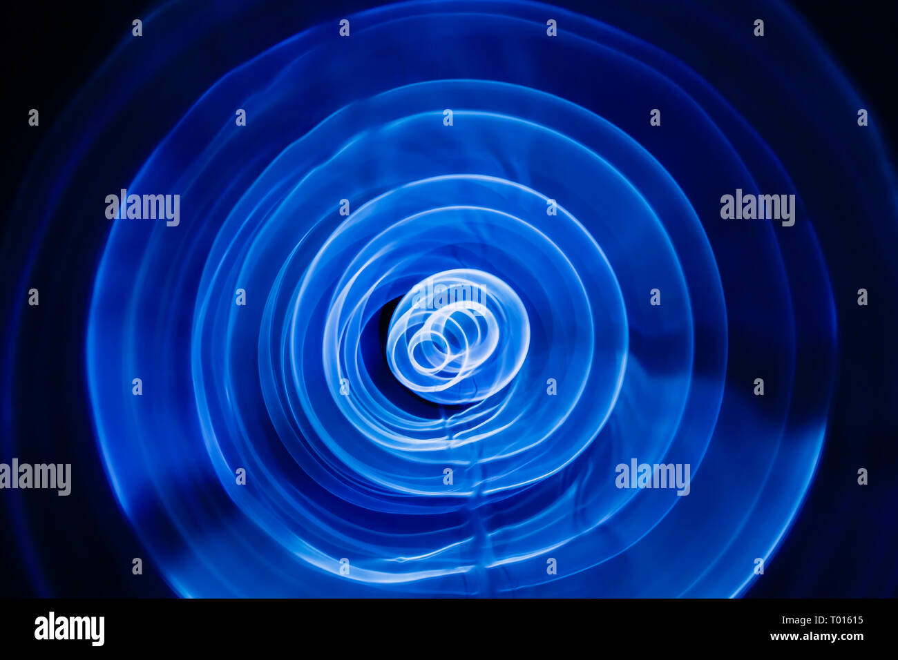 Sound waves in the visible blue color in the dark Stock Photo - Alamy
