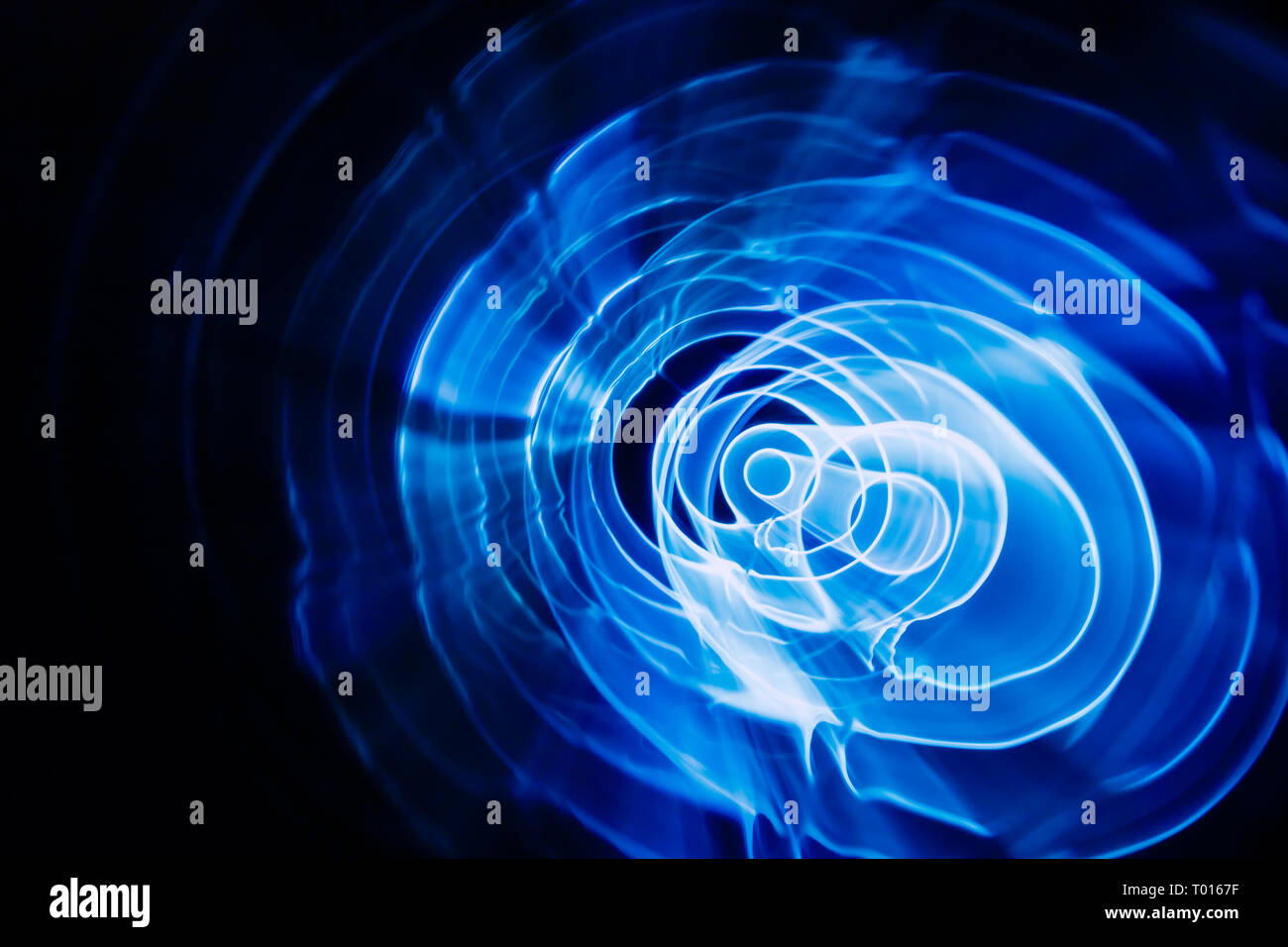 Sound waves in the visible blue color in the dark Stock Photo - Alamy