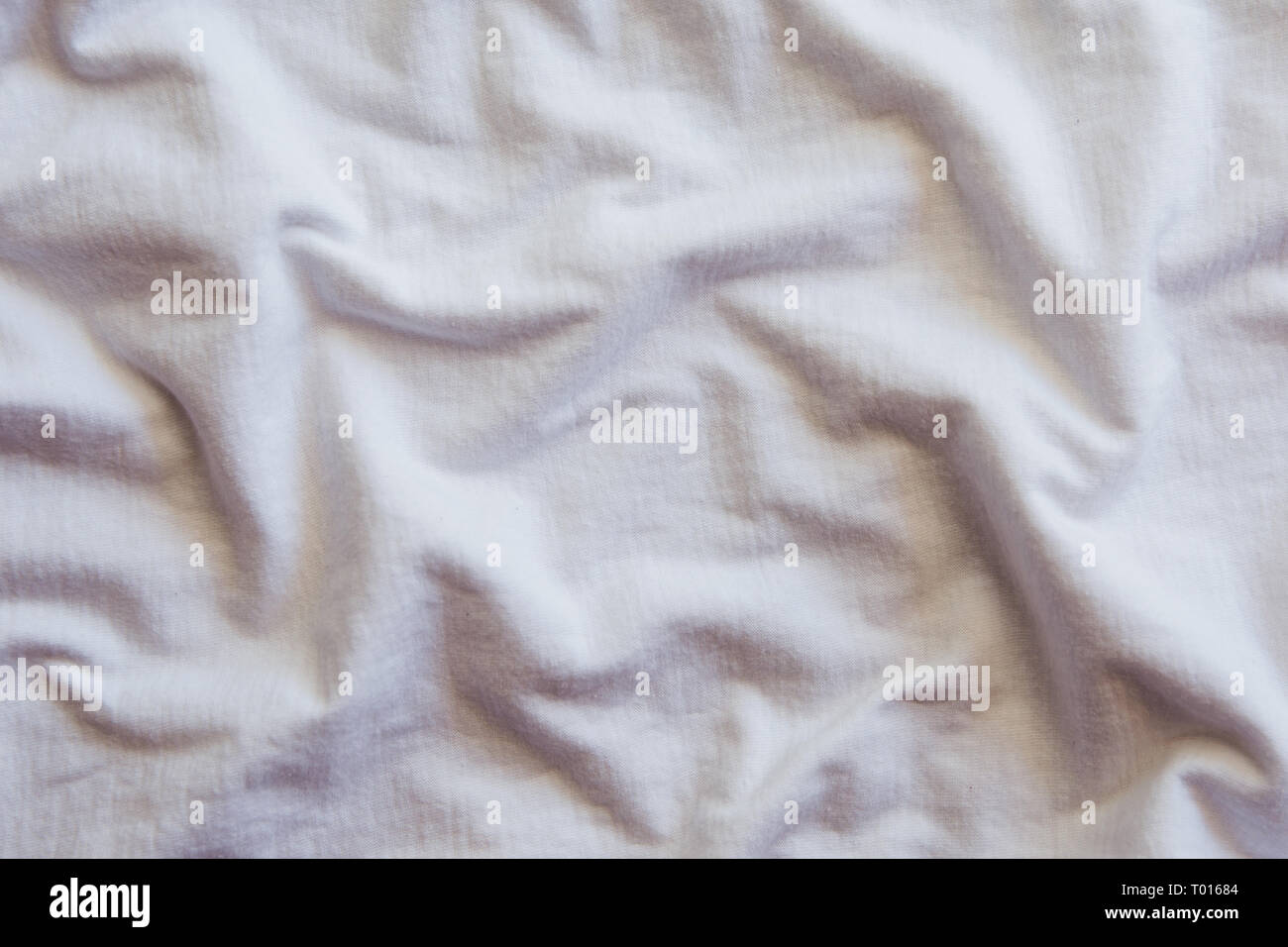 Crumpled white Cotton Fabric Texture Stock Photo - Alamy