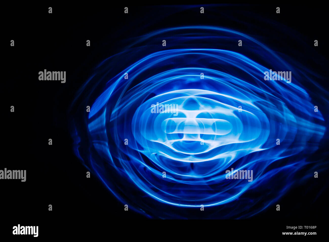 Sound waves in the visible blue color in the dark Stock Photo - Alamy