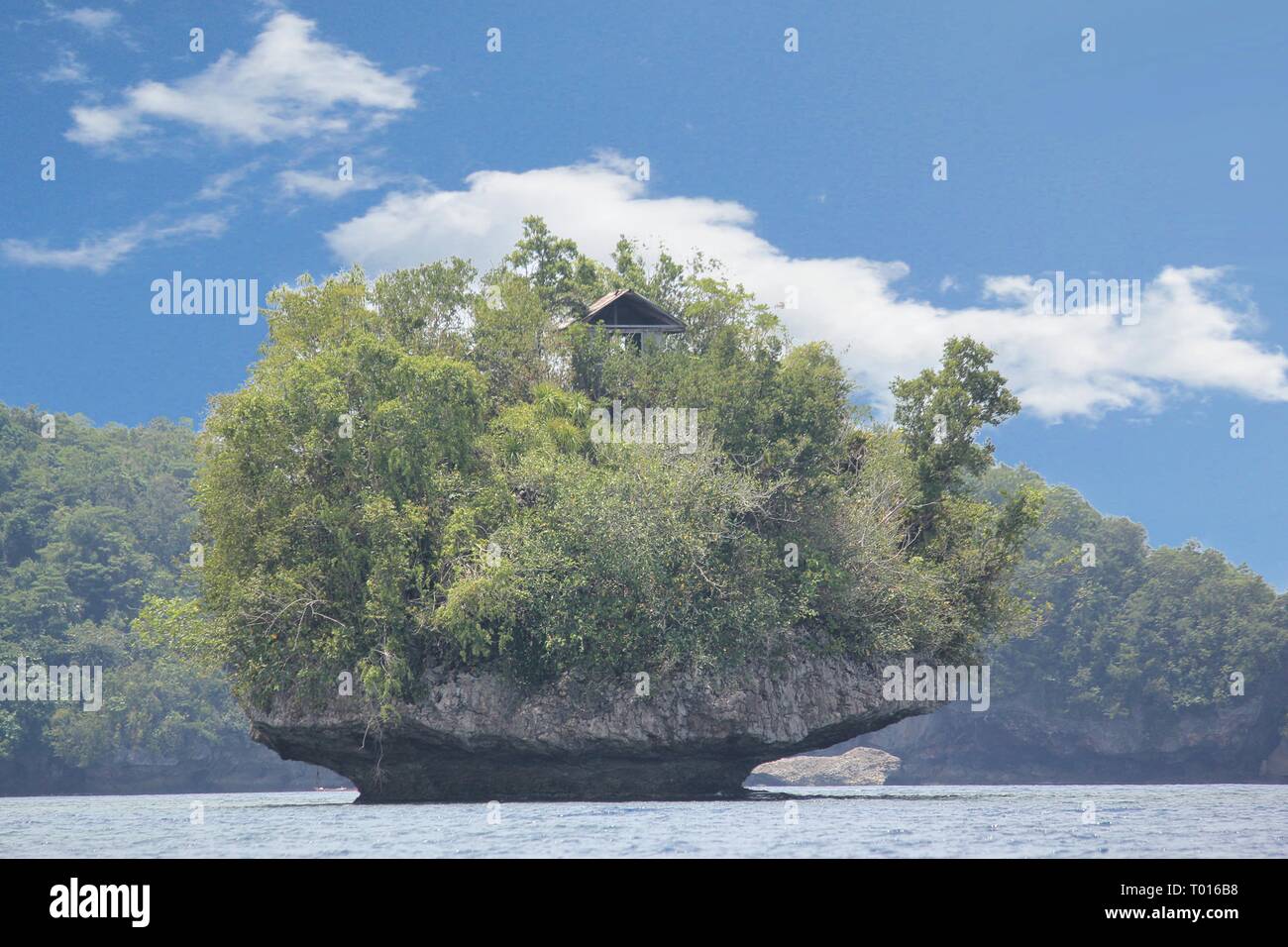 Rest house on top of a small rock island in Surigao, Philippines Stock ...
