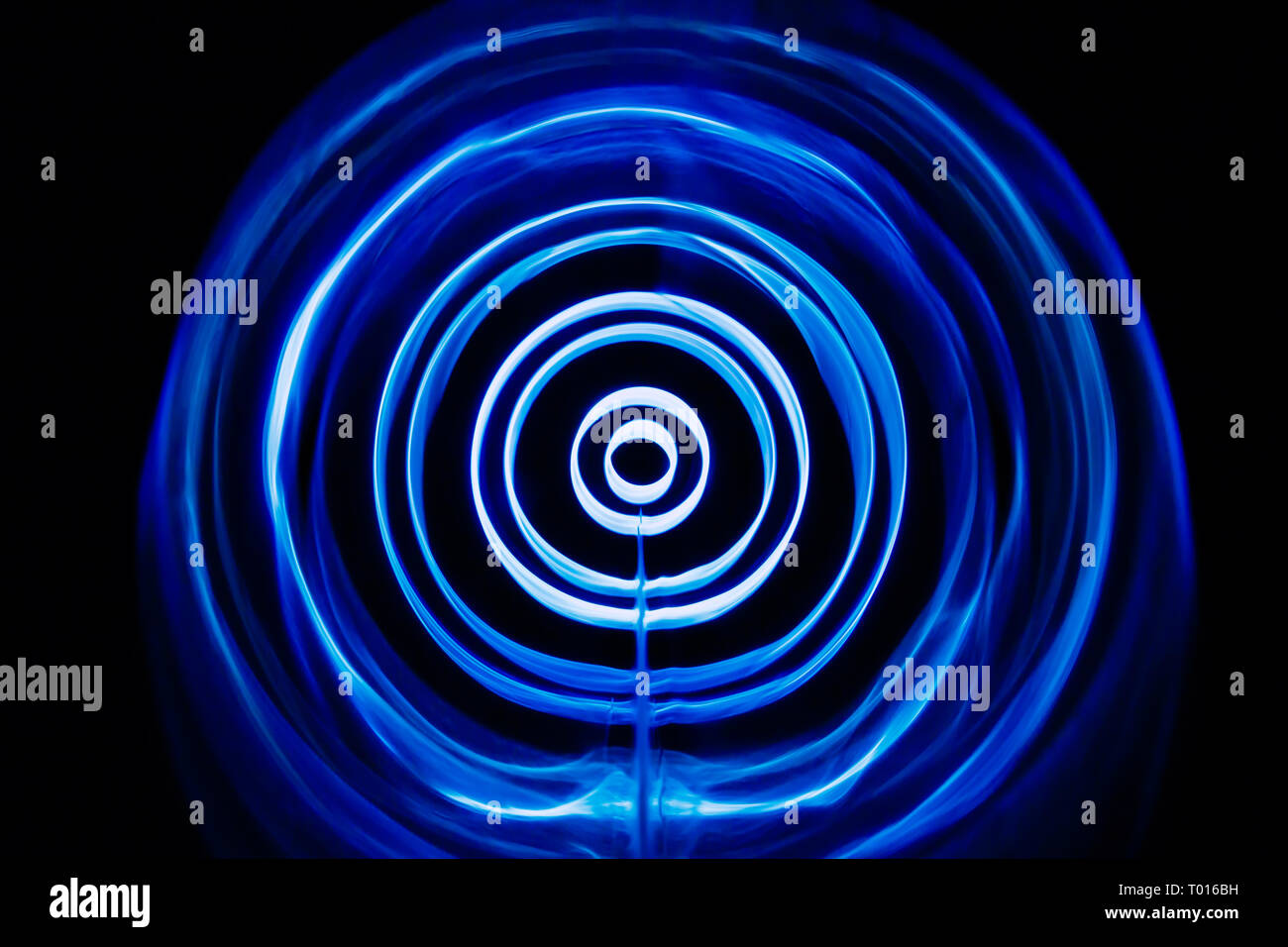 Sound waves in the visible blue color in the dark Stock Photo - Alamy