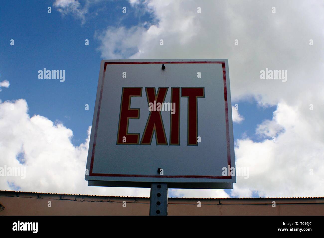 Exit sign in white board with clouds and skies background Stock Photo ...