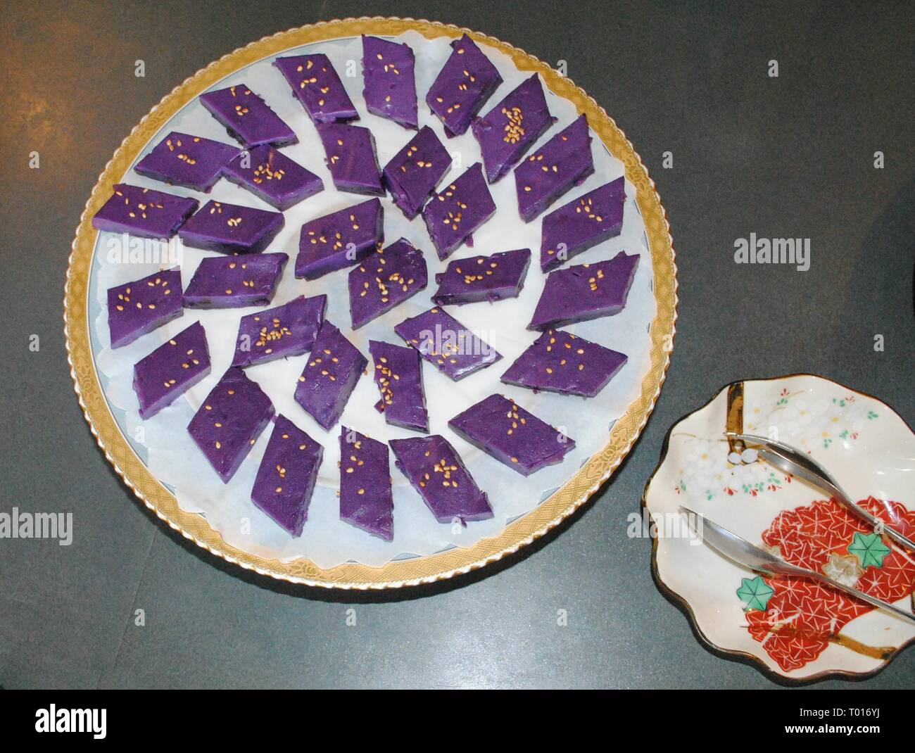 Round plate filled with delicious sapin-sapin, a favorite delicacy in ...