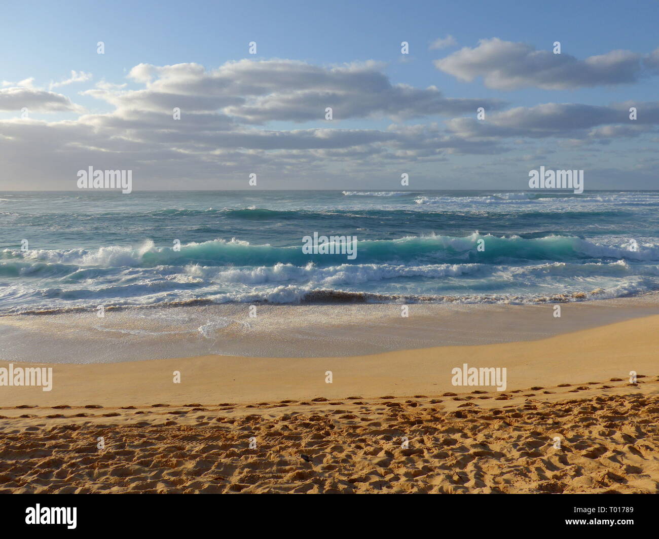 Sunset Beach Waves Stock Photo - Alamy