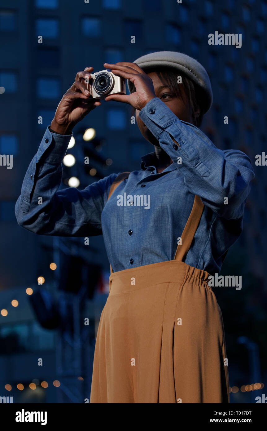 Montreal,Canada.A young woman taking a picture Stock Photo - Alamy