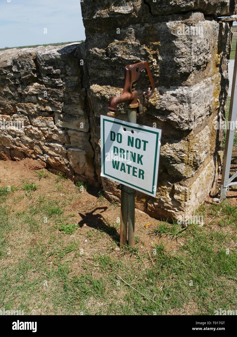 Rusty faucet with a “Do not drink water” sign Stock Photo - Alamy
