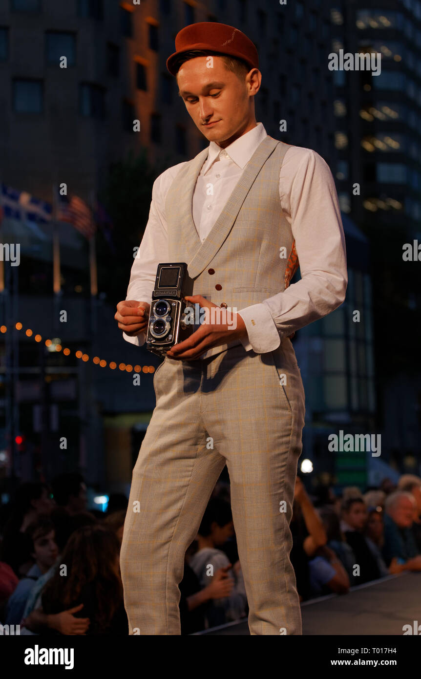 Quebec,Canada. A male model on the runway with a Rolleiflex medium ...