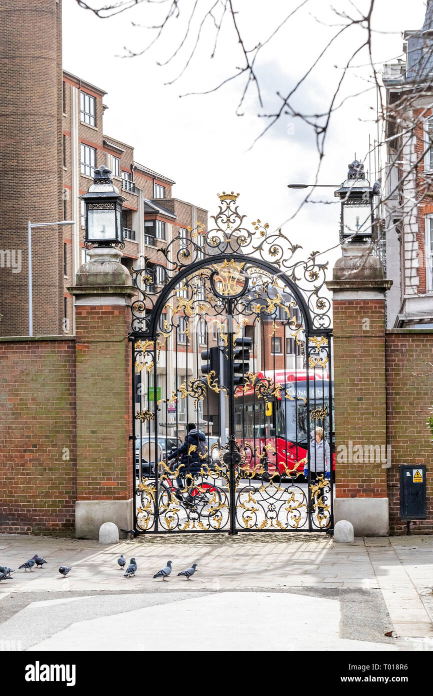 Ornamental gate entrance to Holland Park, Kensington High St ...