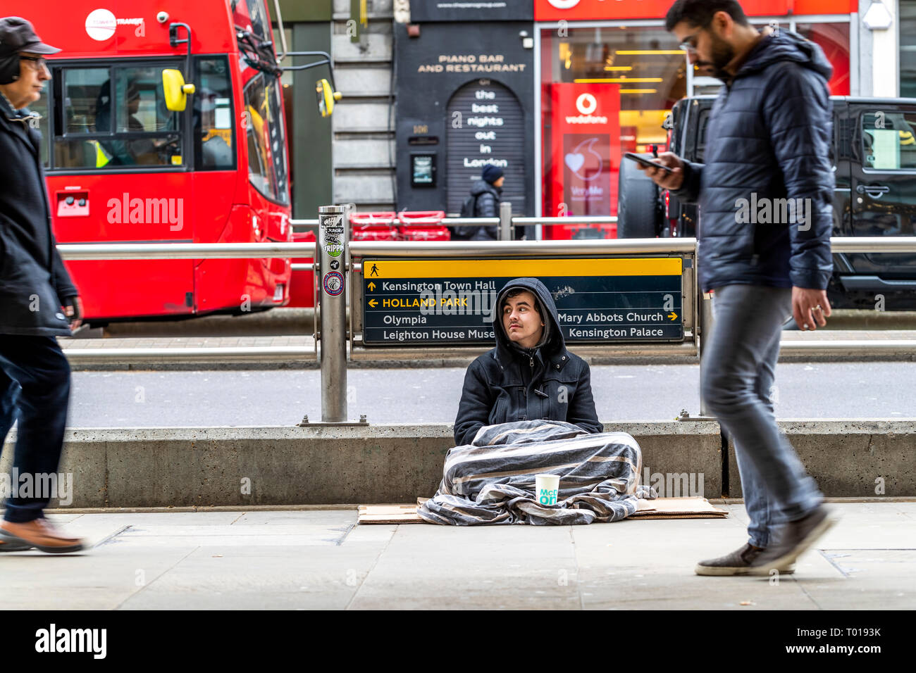 Invisible man. A young man, Connor, is homeless. He sits outside ...