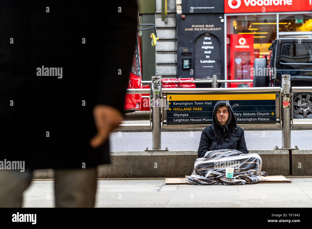 Invisible man. A young man, Connor, is homeless. He sits outside ...