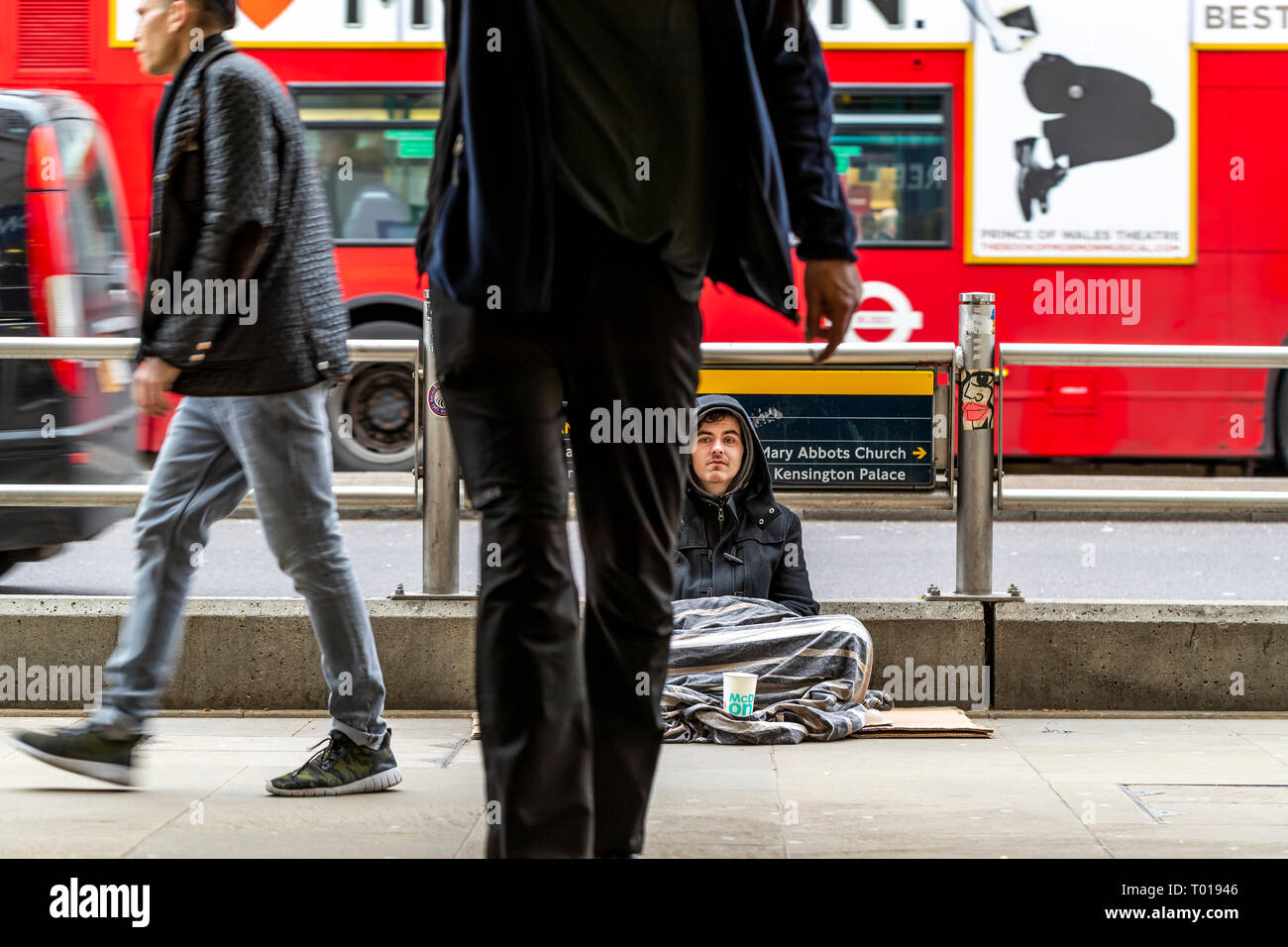 Invisible man. A young man, Connor, is homeless. He sits outside ...