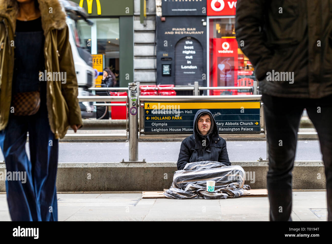 Invisible man. A young man, Connor, is homeless. He sits outside ...