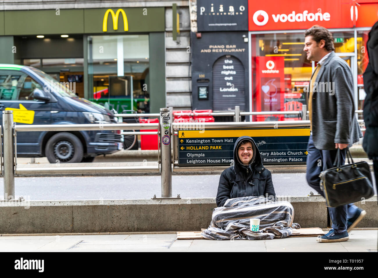 Invisible man. A young man, Connor, is homeless. He sits outside ...
