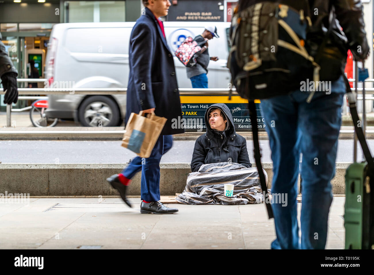 Invisible man. A young man, Connor, is homeless. He sits outside ...