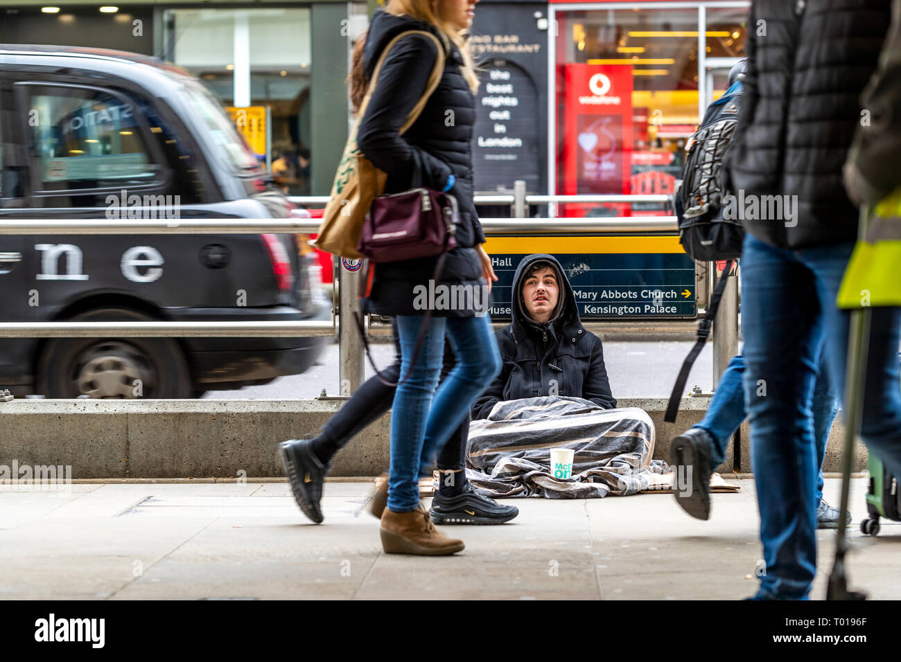 Invisible man. A young man, Connor, is homeless. He sits outside ...