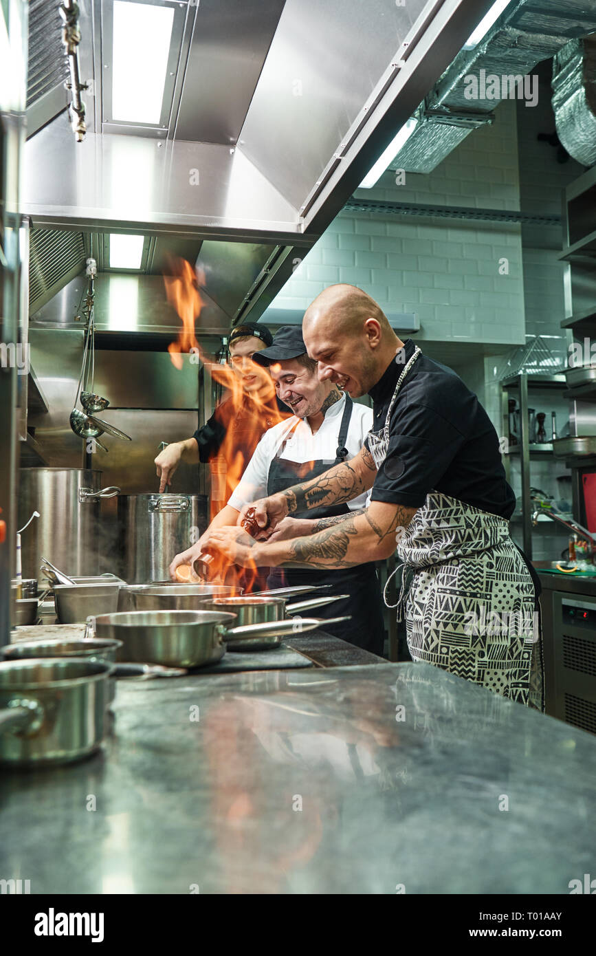 Chef cooking flame hi-res stock photography and images - Alamy