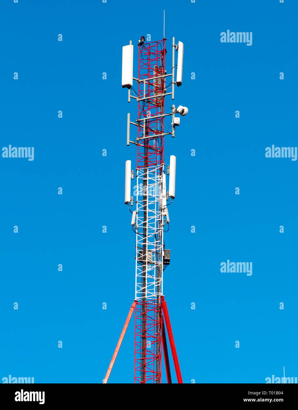 High resolution image. Detail of a transmitter tower against clear blue ...