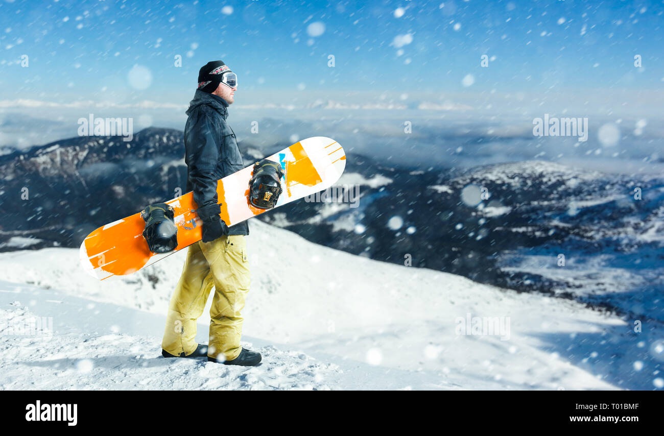 Snowboard on mountain top hi-res stock photography and images - Alamy