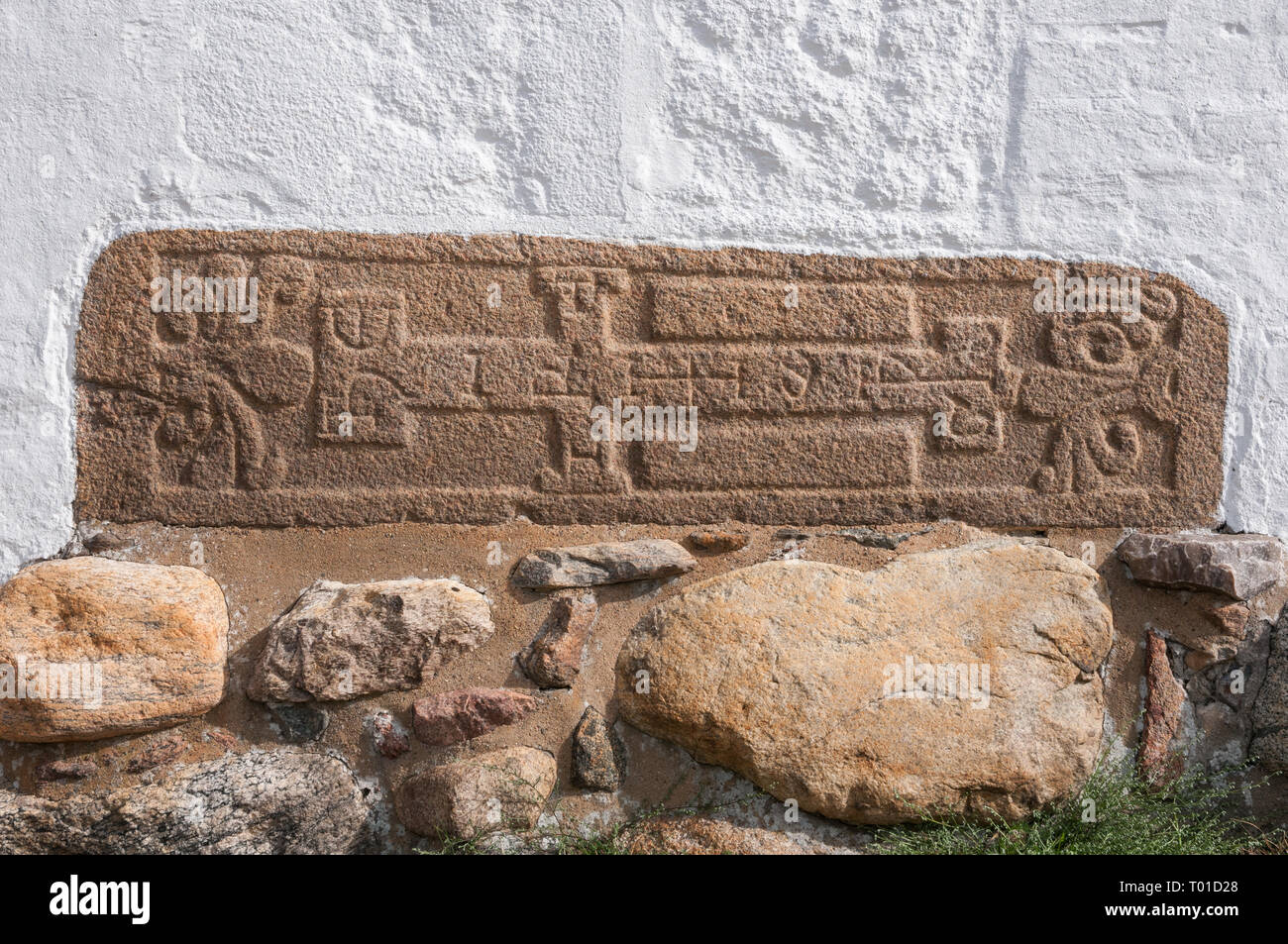Romanesque gravestone at the entrance to Hune church, Denmark Stock ...
