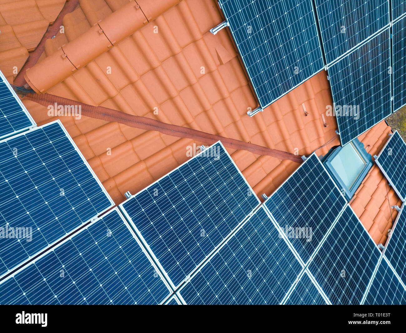 Aerial top view of new modern residential house cottage with blue shiny ...