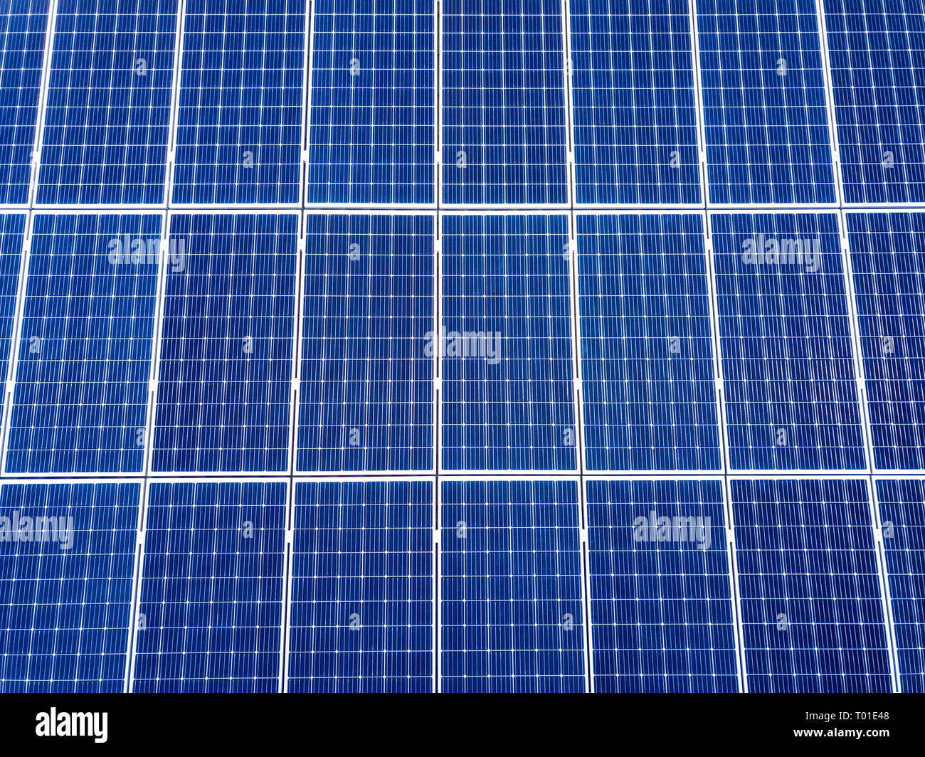 Close-up surface of blue shiny solar photo voltaic panels system on ...