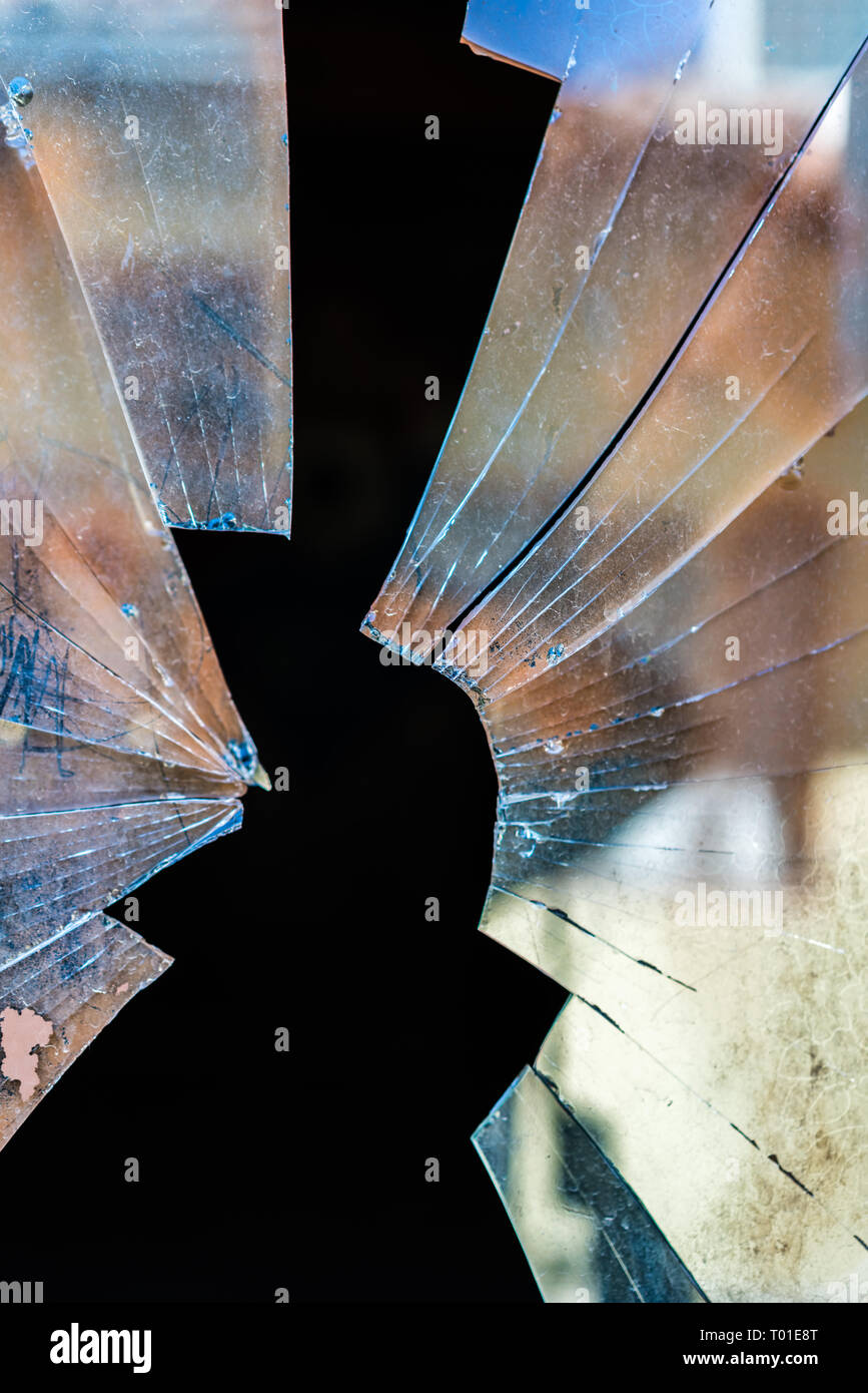 Shattered door glass window with sharp edges Stock Photo - Alamy