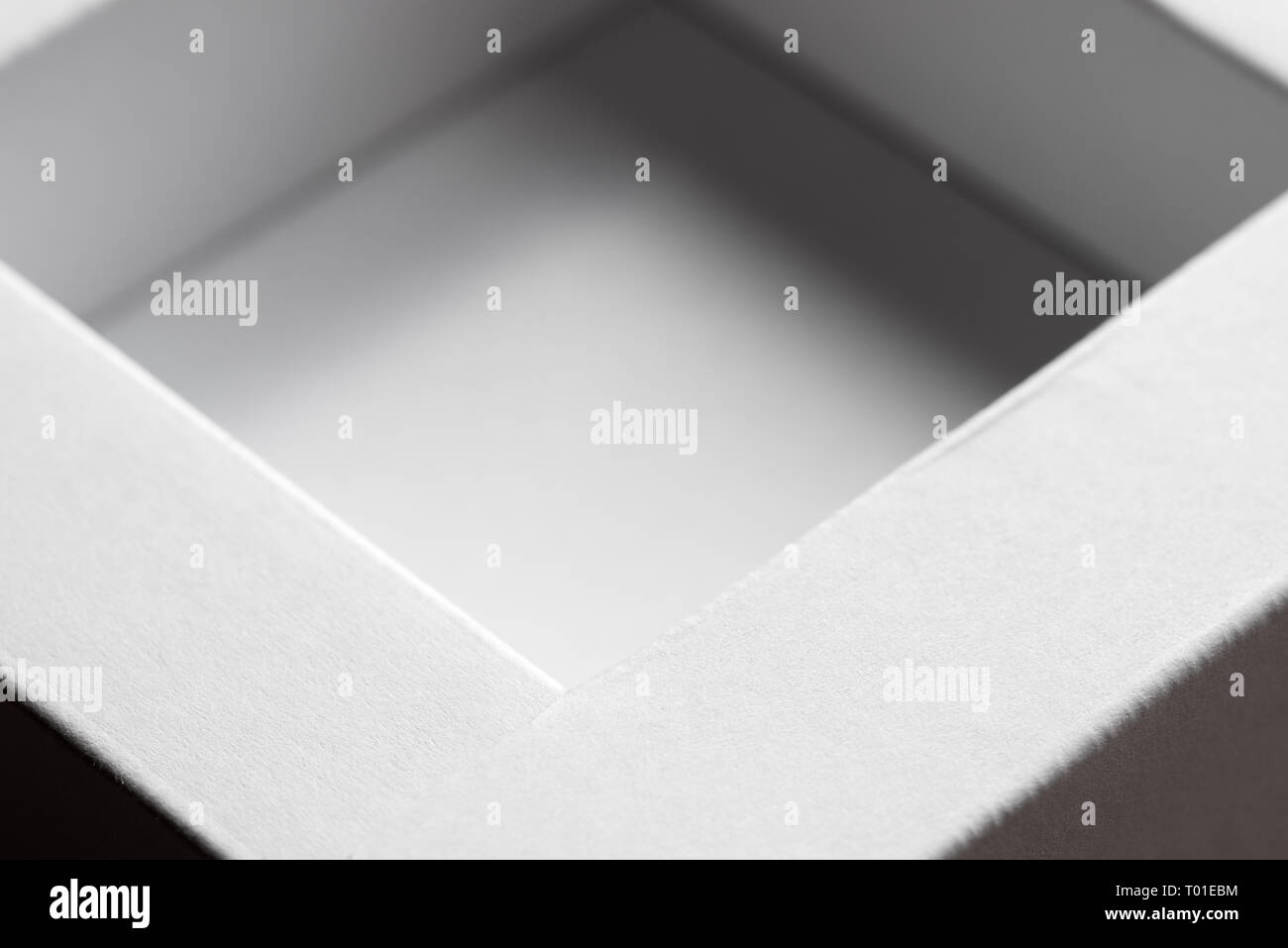 small white cardboard box macro inside Stock Photo - Alamy