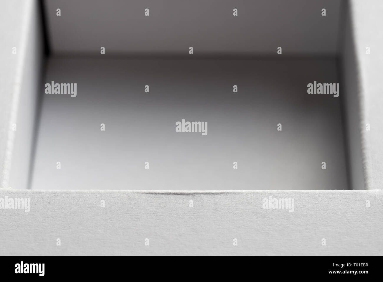 small white cardboard box macro inside Stock Photo - Alamy