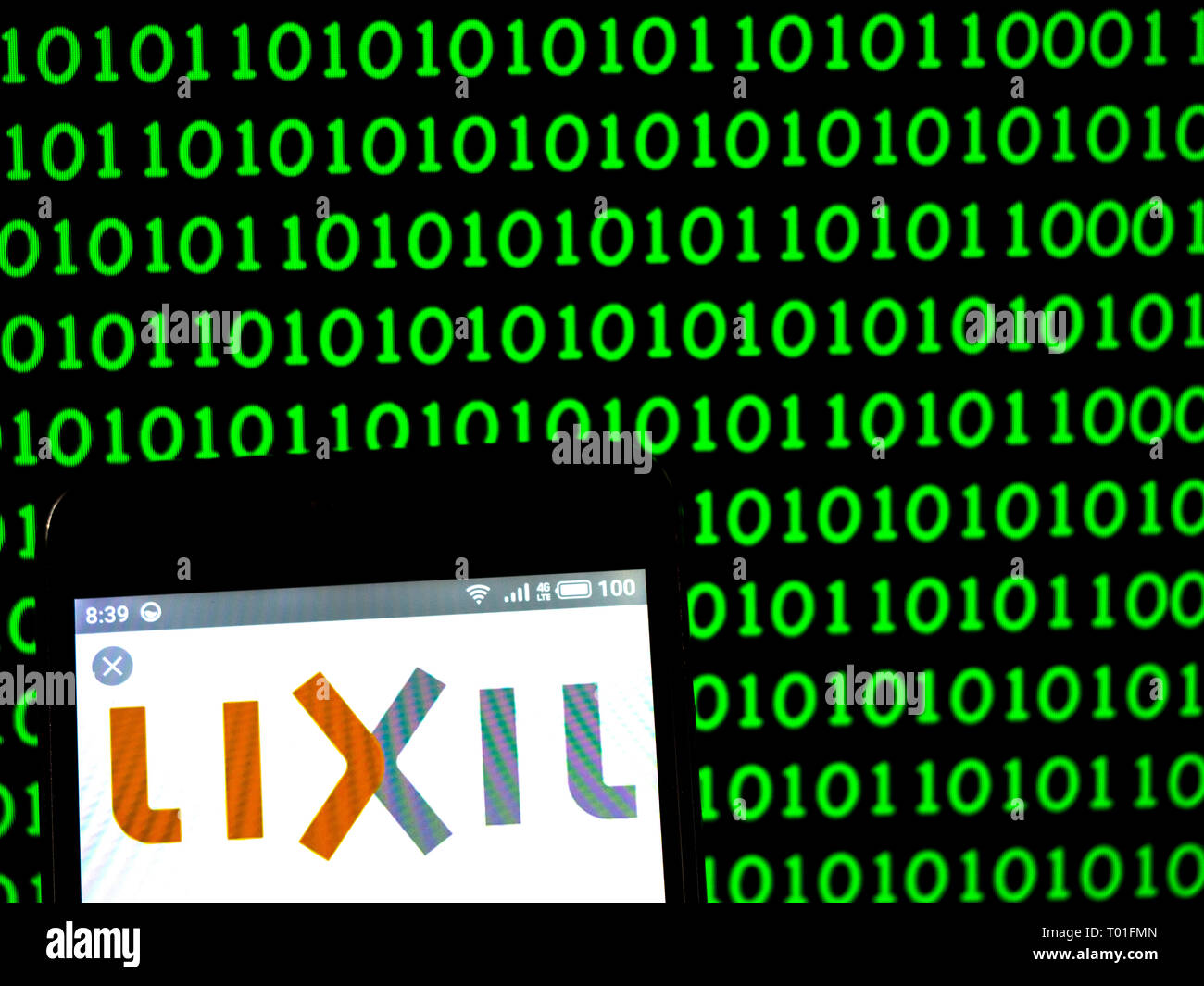 Lixil Group Corporation logo seen displayed on smart phone Stock Photo ...