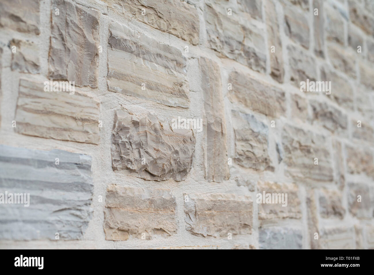 traditional wall of block of stones Stock Photo - Alamy
