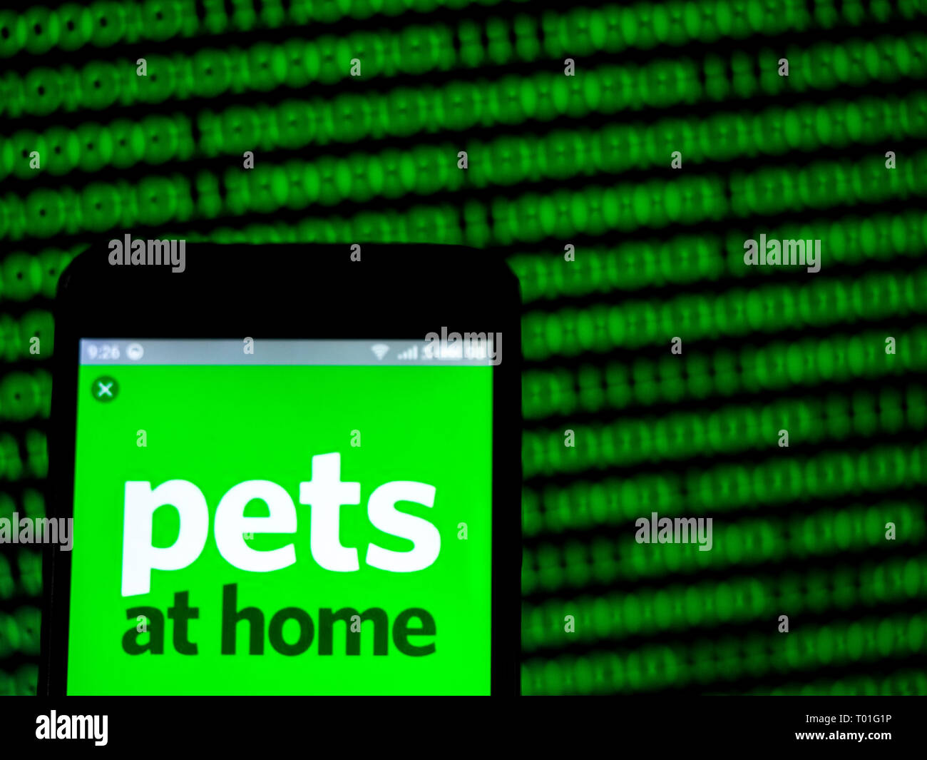 Pets at Home Group plc logo seen displayed on smart phone Stock Photo ...