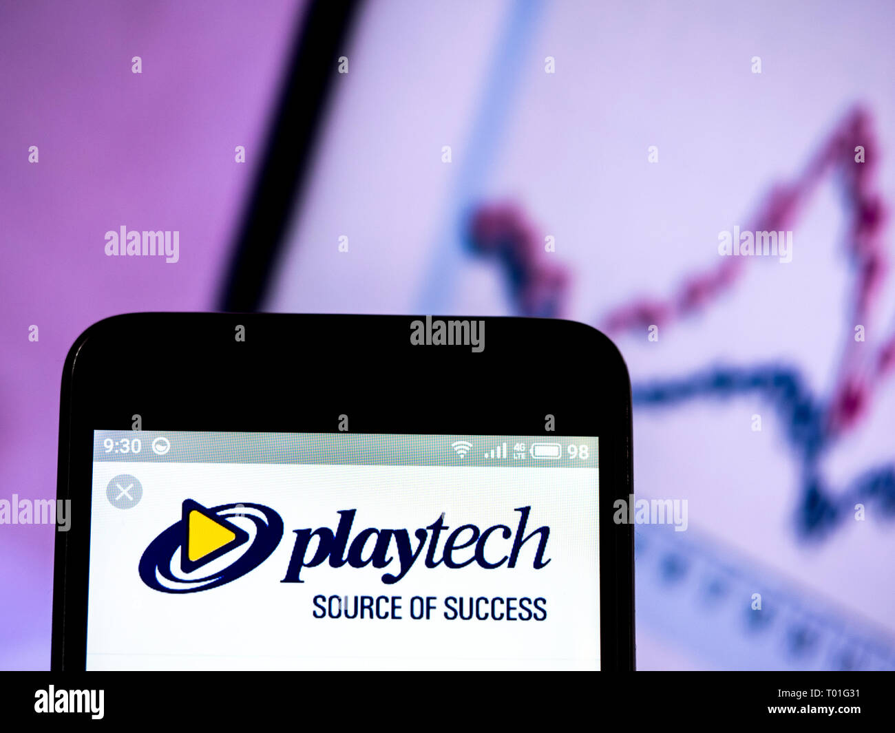 Playtech PLC logo seen displayed on smart phone Stock Photo - Alamy