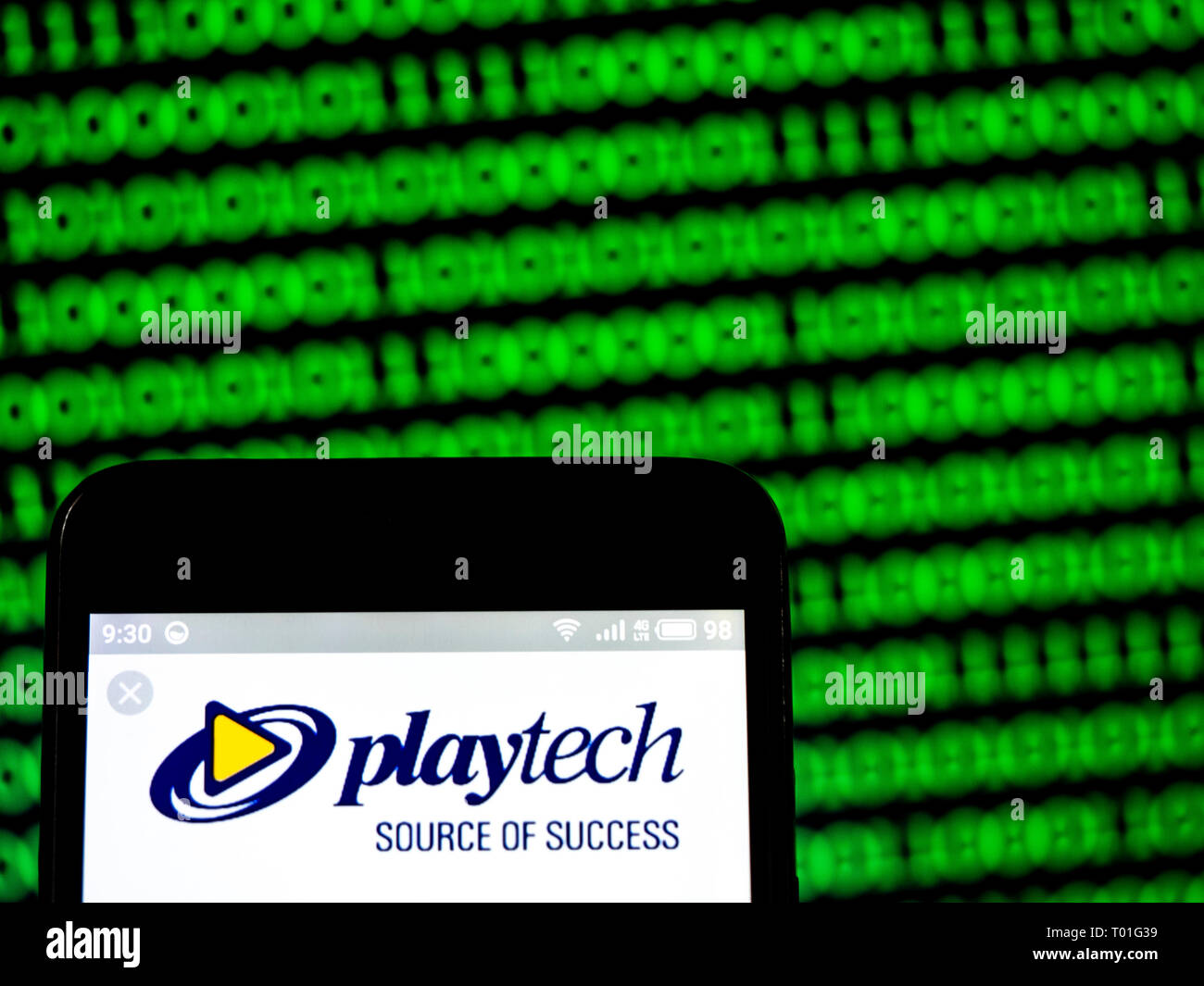 Playtech PLC logo seen displayed on smart phone Stock Photo - Alamy