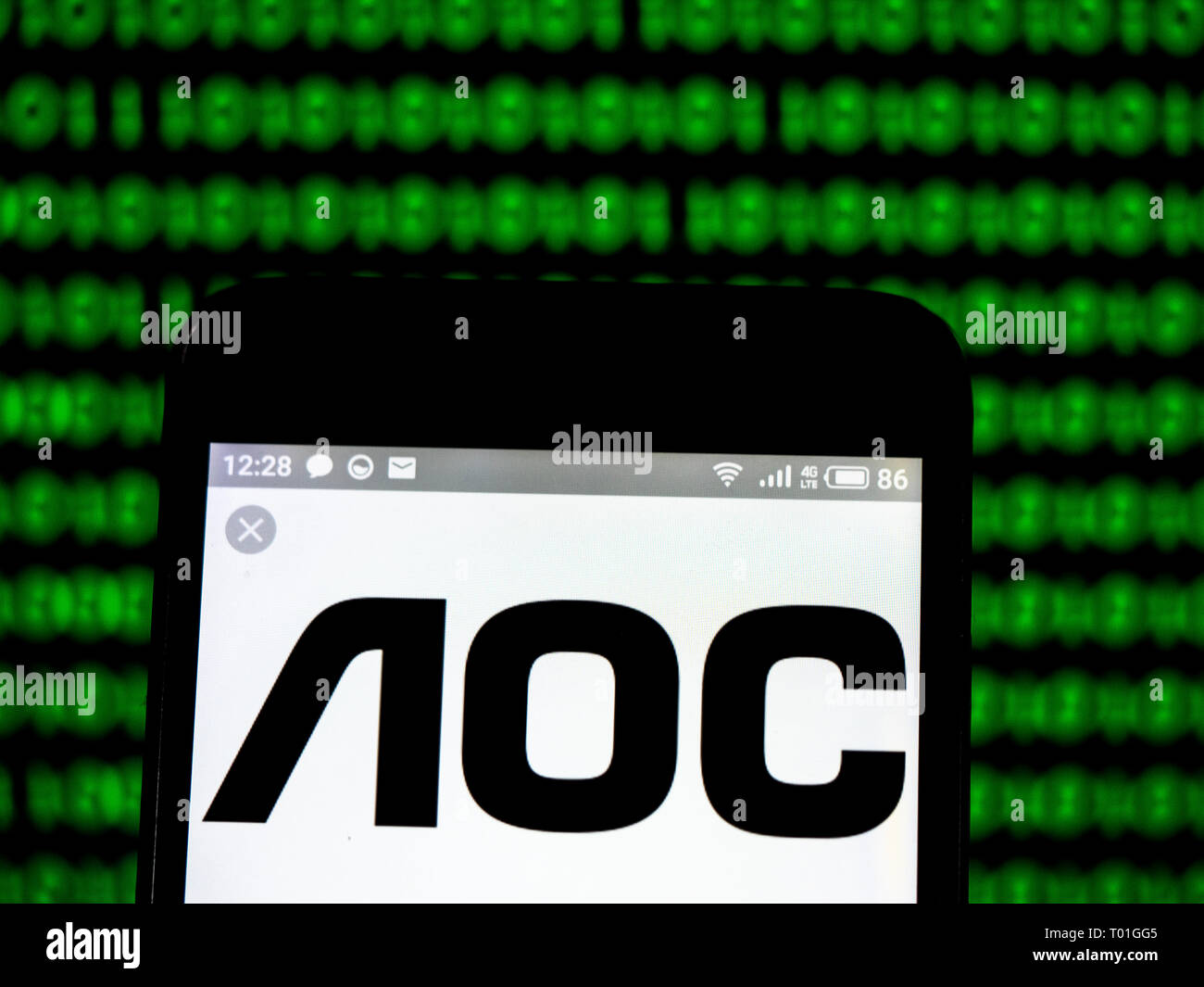AOC Holdings logo seen displayed on smart phone Stock Photo - Alamy