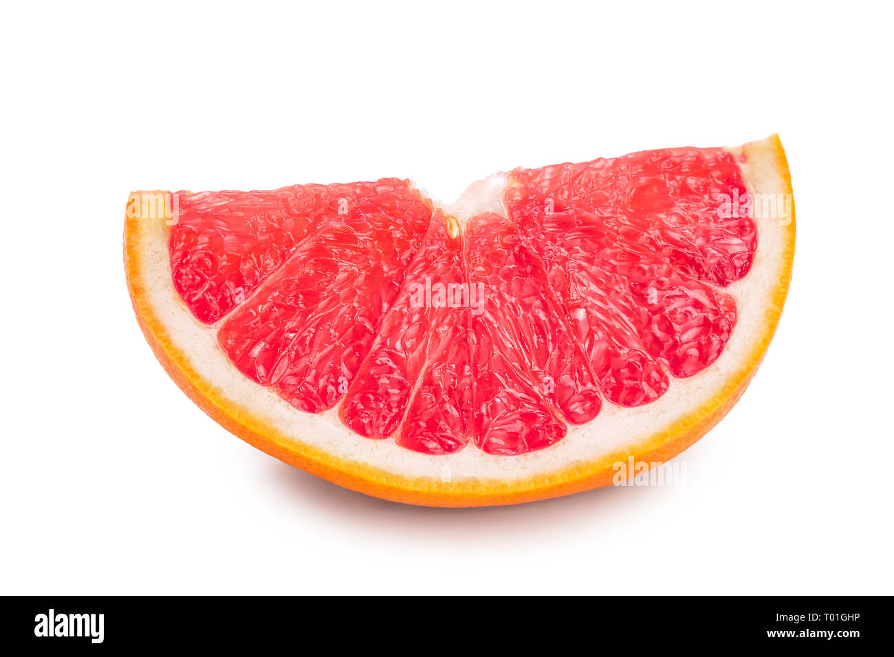 Grapefruit slice isolated on white background closeup Stock Photo - Alamy