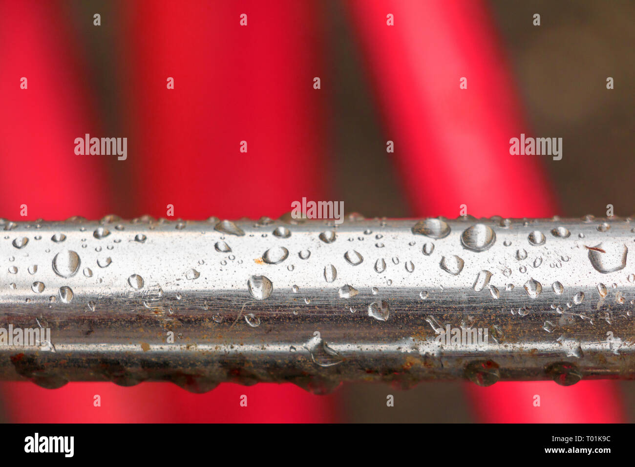 water drops on old metallic steel pipe aluminum background with copy ...
