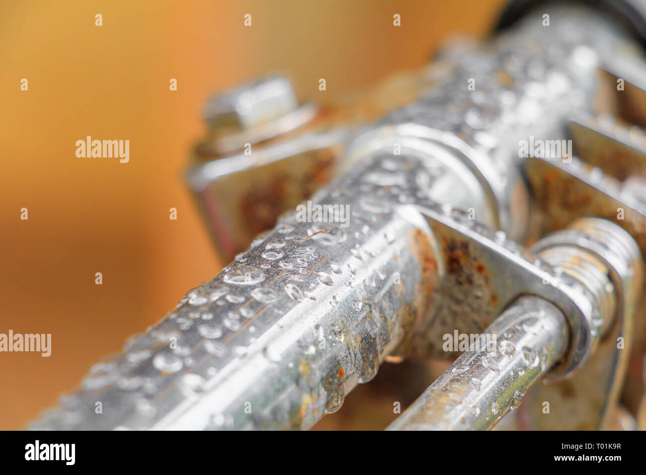 water drops on old metallic steel pipe aluminum background with copy ...